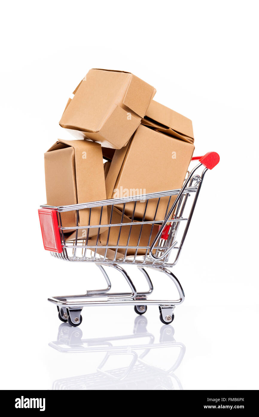 Shopping cart full of cardboard boxes, isolated on white background ...