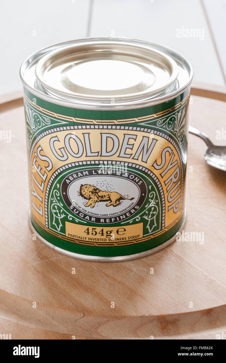 Lyle's Golden Syrup in its distinctive green and gold tin marketed ...