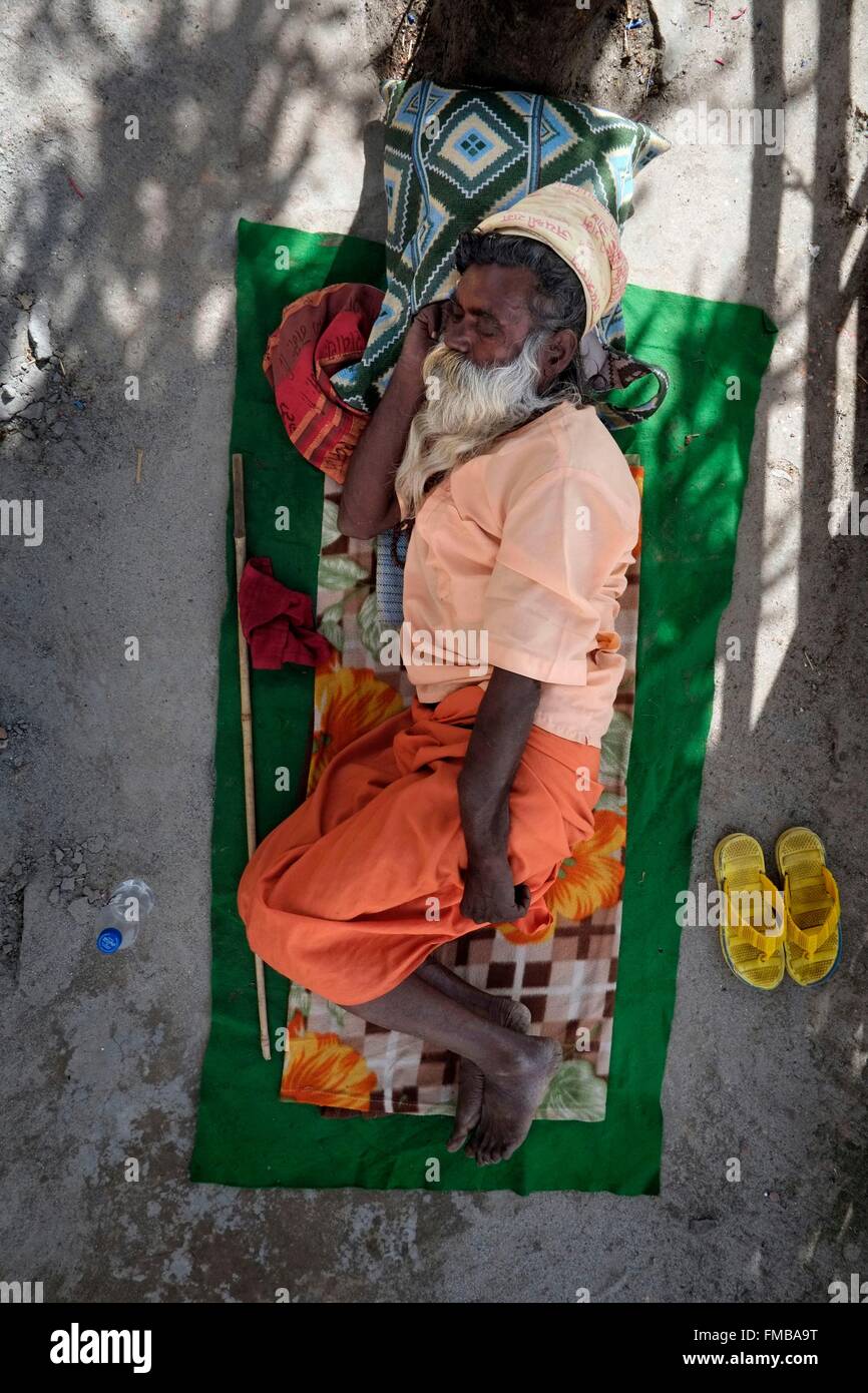 India, Uttarakhand State, Rishikesh, people sleeping, day and night ...