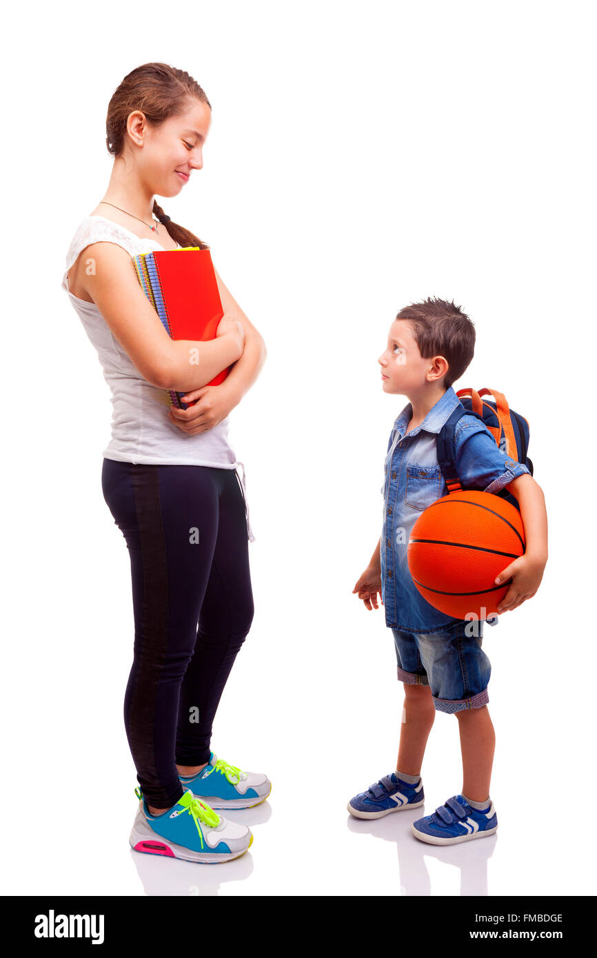 School kids standing on white background Stock Photo - Alamy