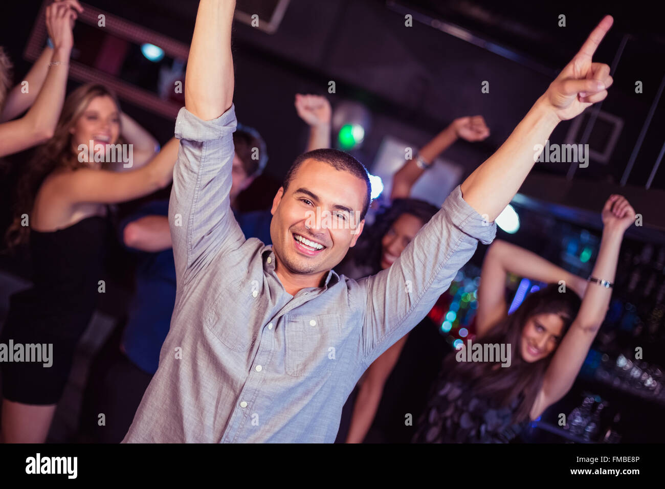 Cute friends having fun and dancing Stock Photo - Alamy