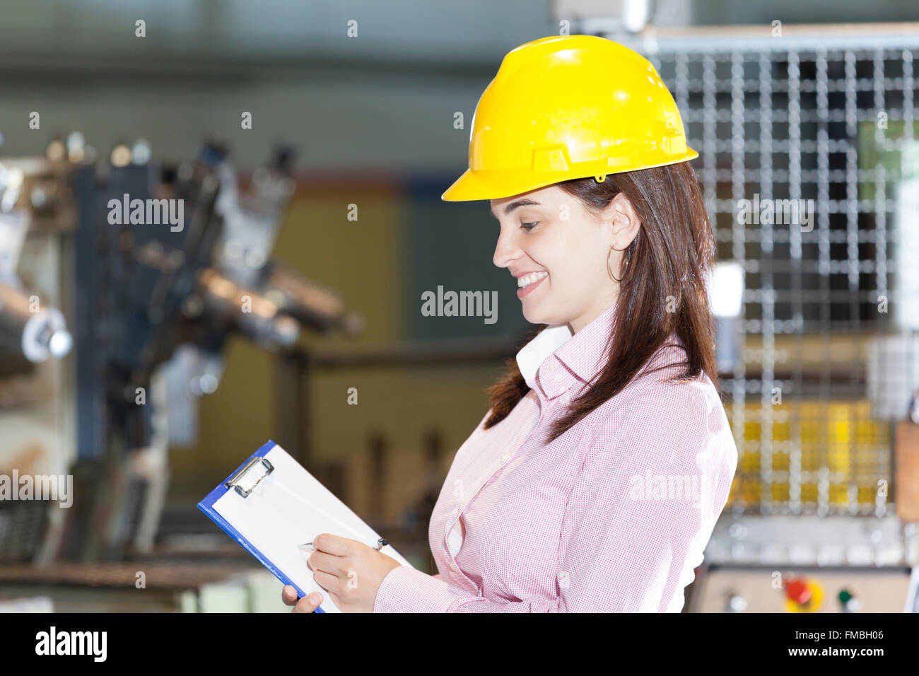 Woman metallurgy worker holding hi-res stock photography and images - Alamy
