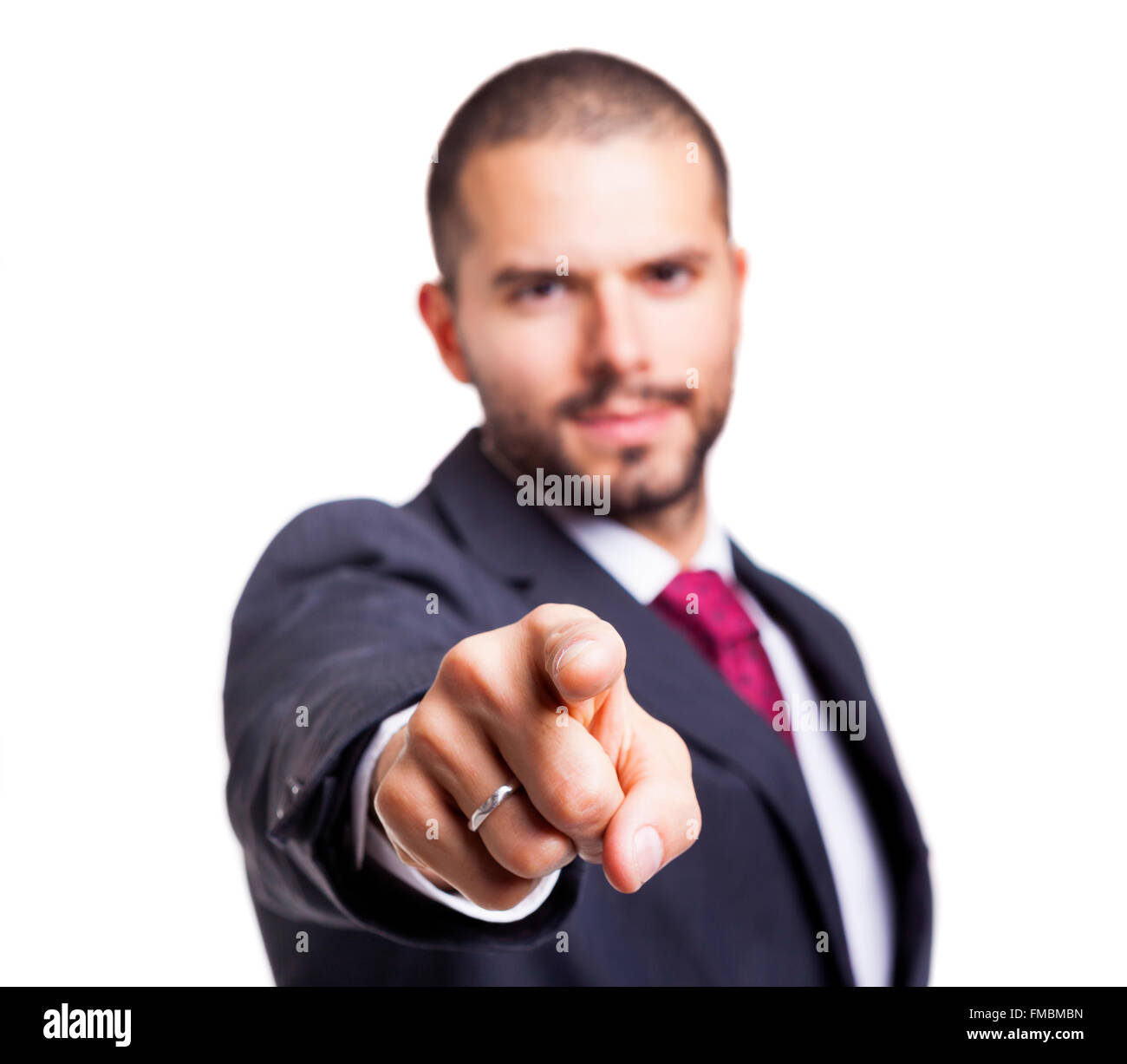 Executive man pointing the finger at you, isolated on white background ...
