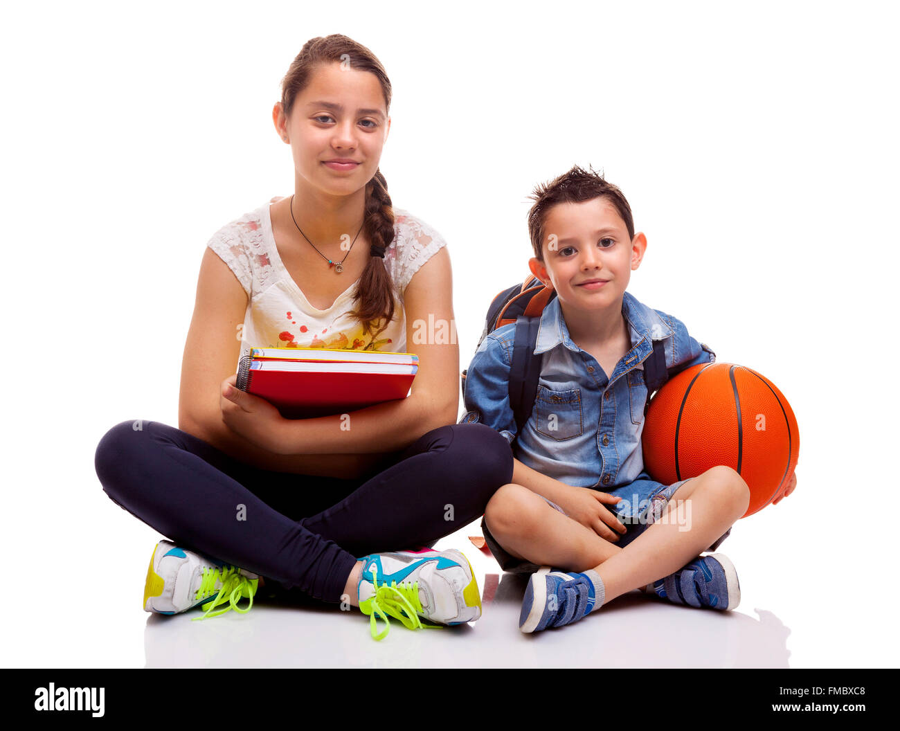 Smiling school kids on white background Stock Photo - Alamy