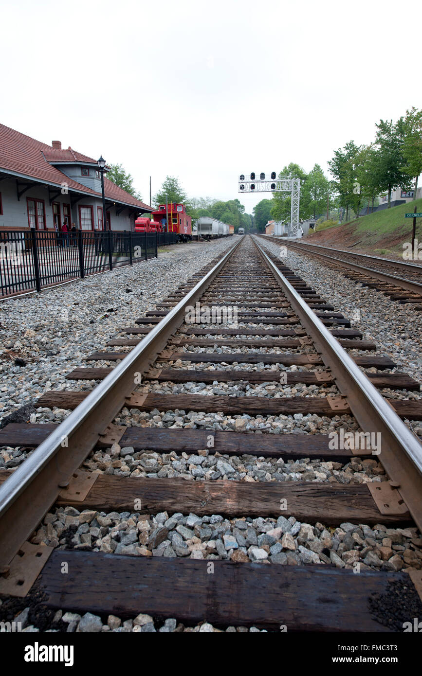 Converging train track lines at a railway station in Cornelia, Georgia ...