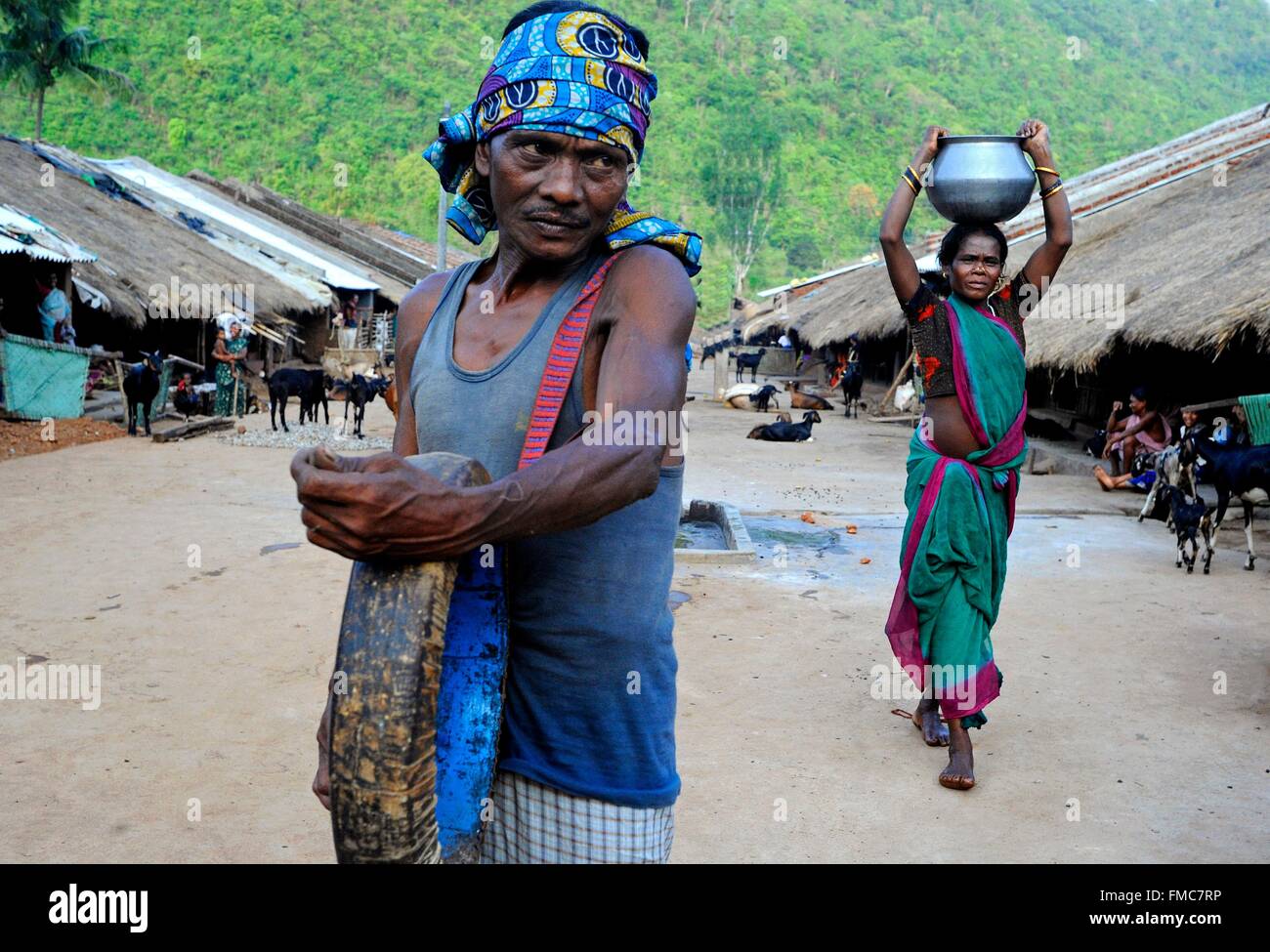 India, Odisha, a musician plays music in a village of Desia Kondh ...