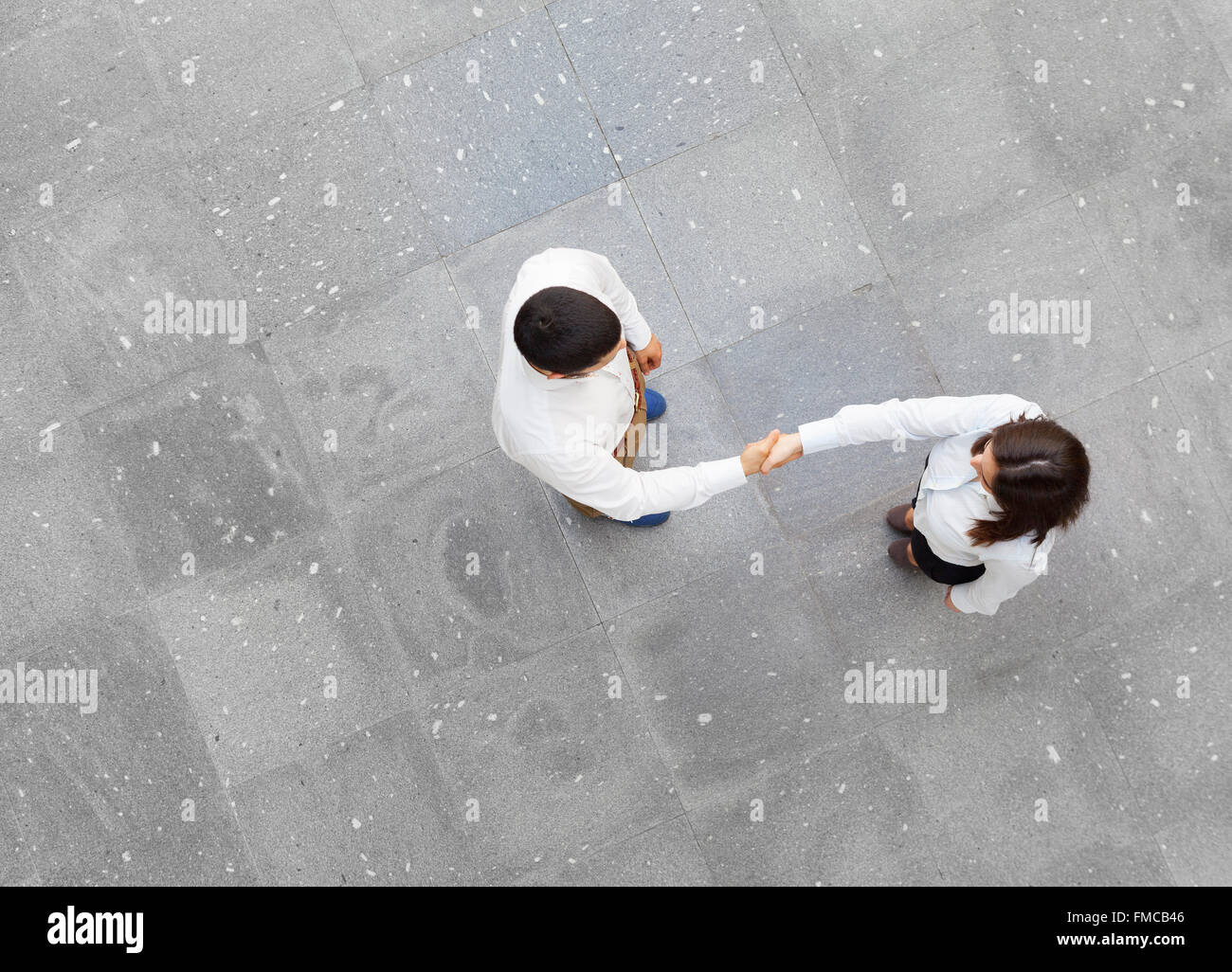 Top view of businesspeople shaking hands Stock Photo - Alamy