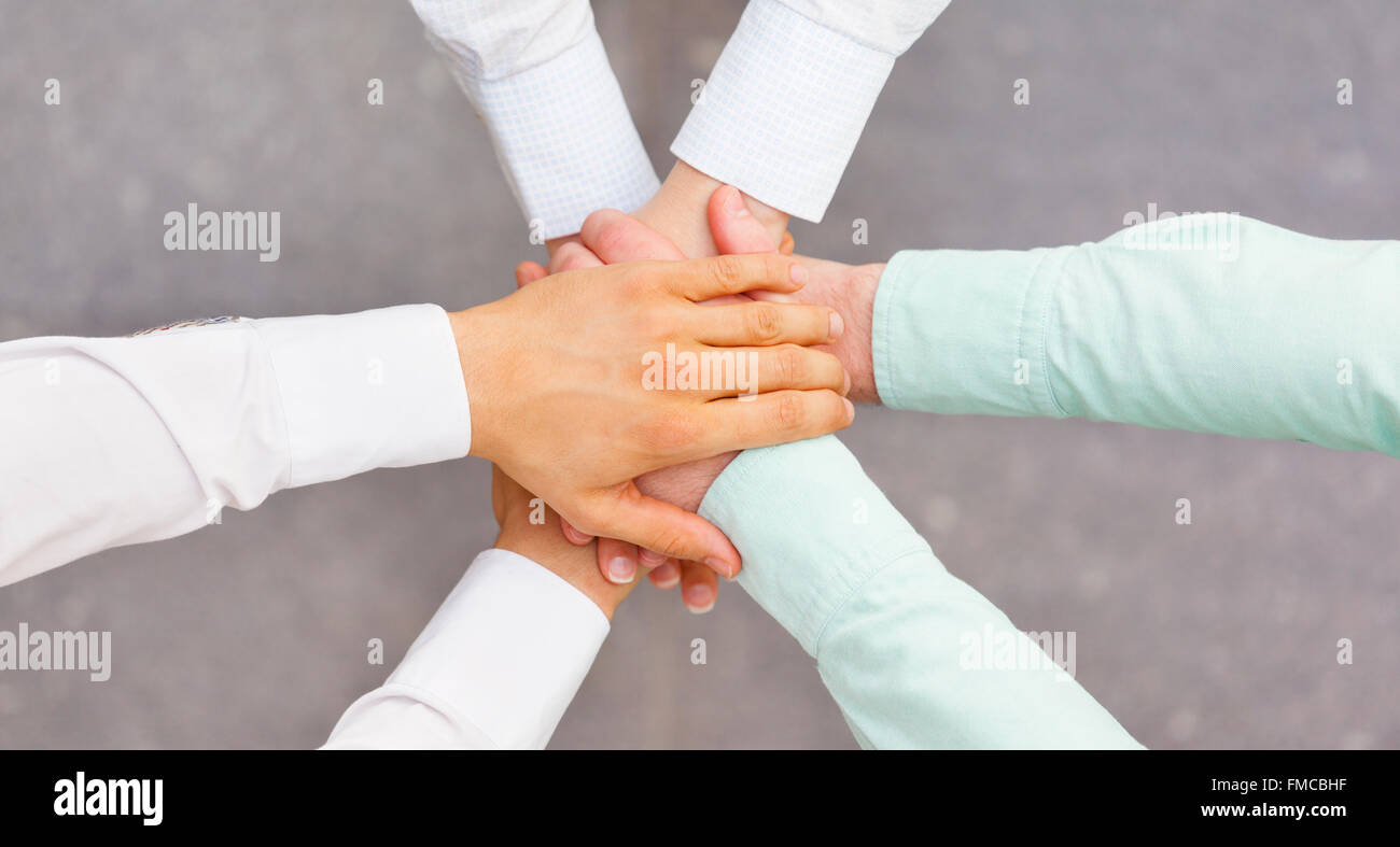 Top view of teamwork handshake Stock Photo - Alamy