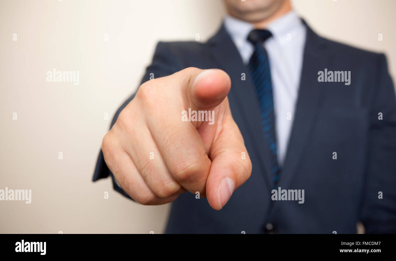 Business man pointing the finger at you, isolated on white background ...