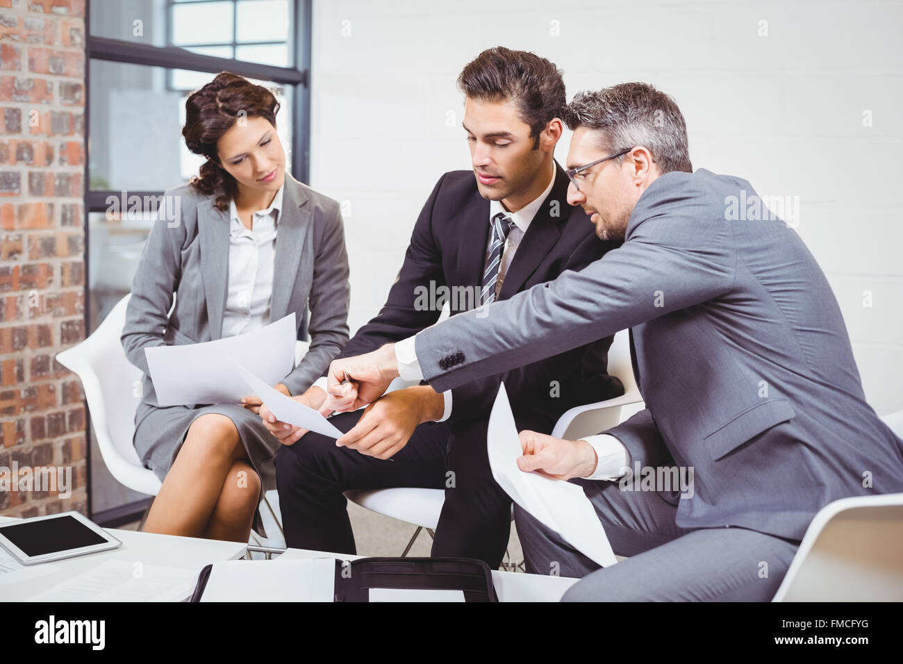 Business people holding documents Stock Photo - Alamy