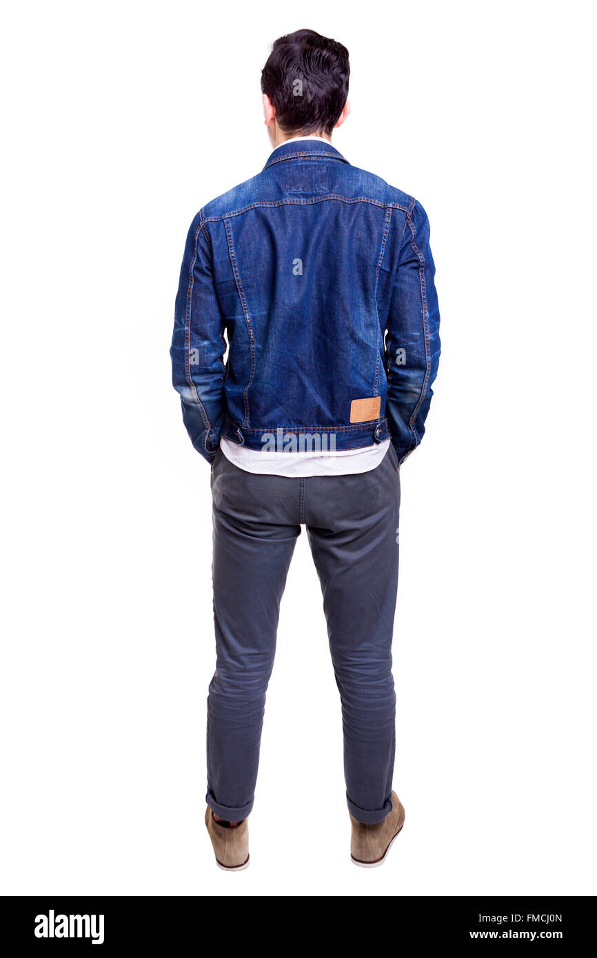 Young casual man standing from back, isolated on white background Stock ...