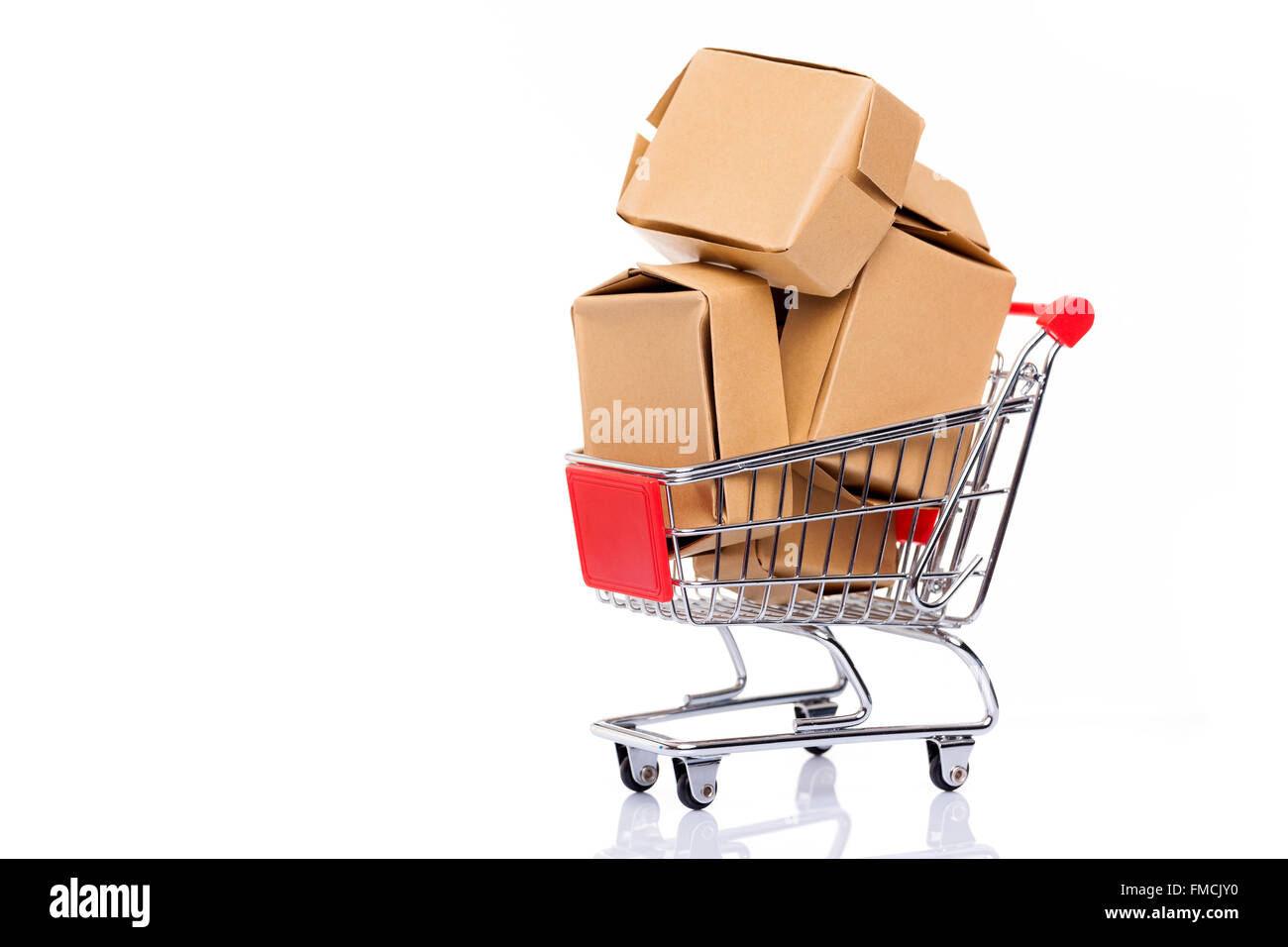 Shopping cart full of cardboard boxes, isolated on white background ...