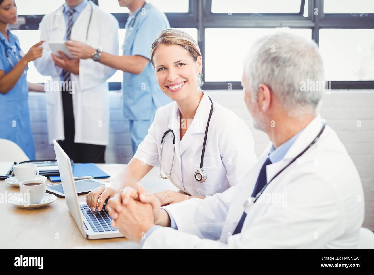 Medical team interacting in hi-res stock photography and images - Alamy