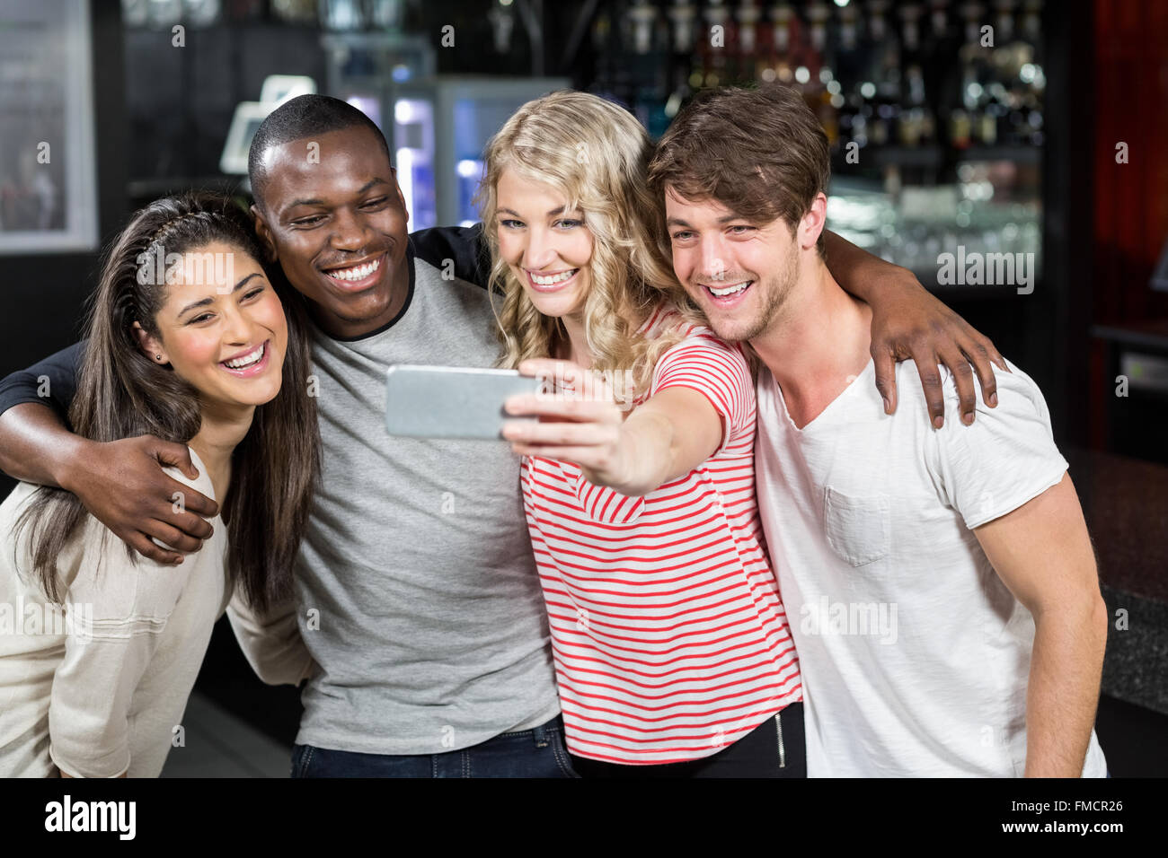 Friends taking a selfie Stock Photo - Alamy