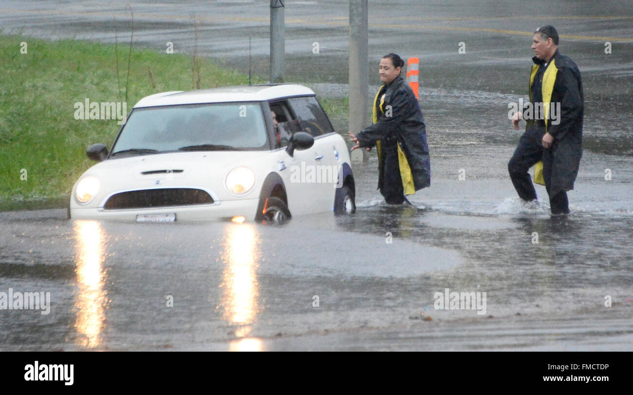 March 7, 2016, Encino California. LAPD officers help out a driver waits ...