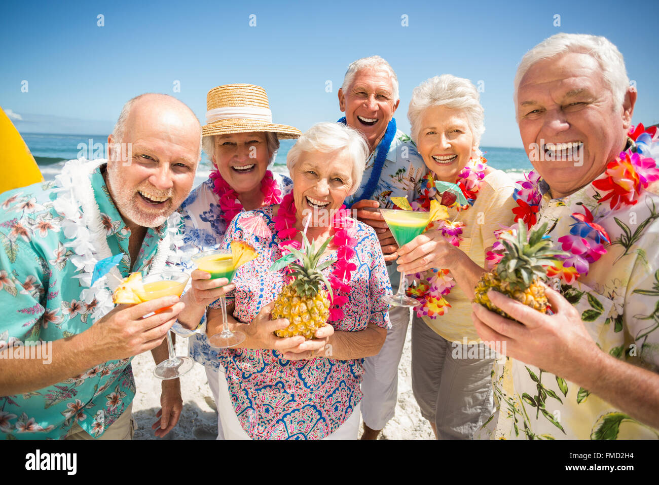 Seniors drinking cocktails Stock Photo - Alamy