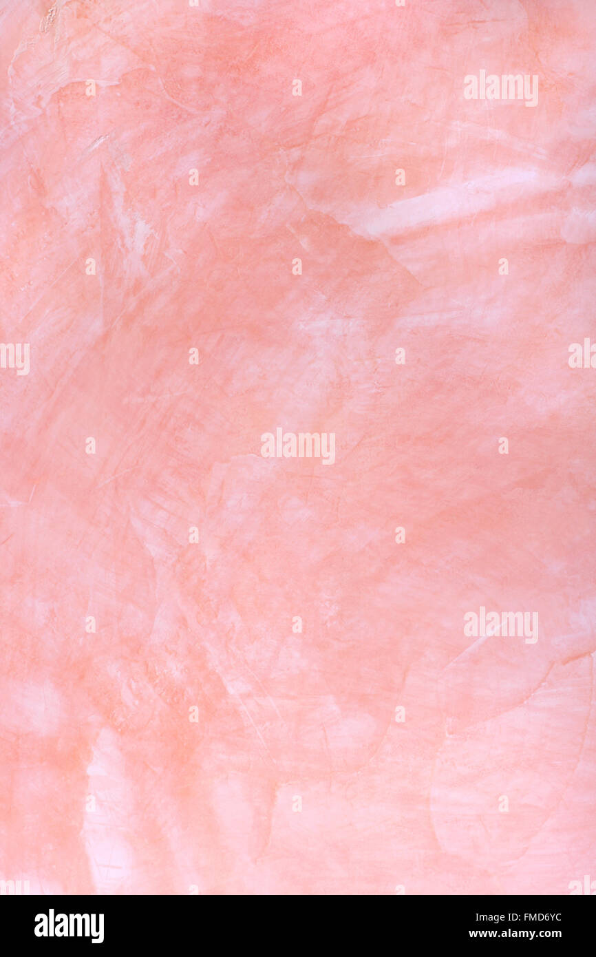 pink plaster with a deep relief on a wall Stock Photo - Alamy