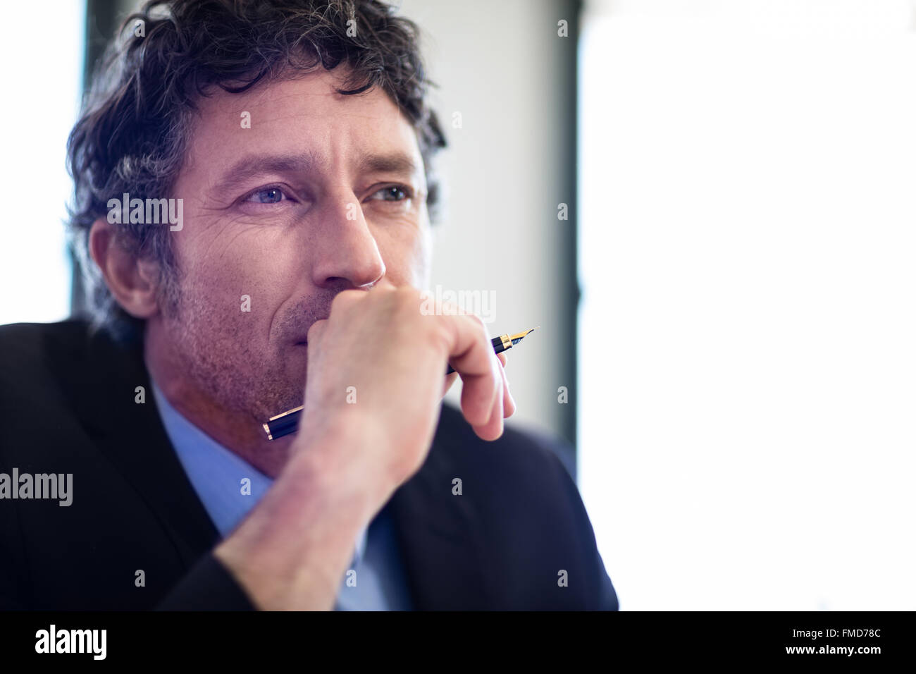 Thoughtful businessman in restaurant Stock Photo - Alamy Thoughtful businessman in restaurant Stock Photo - Alamy