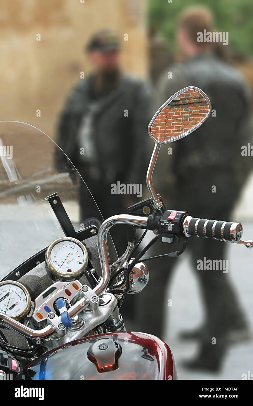 Modern motorcycle on a background of group of motorcyclists Stock Photo ...
