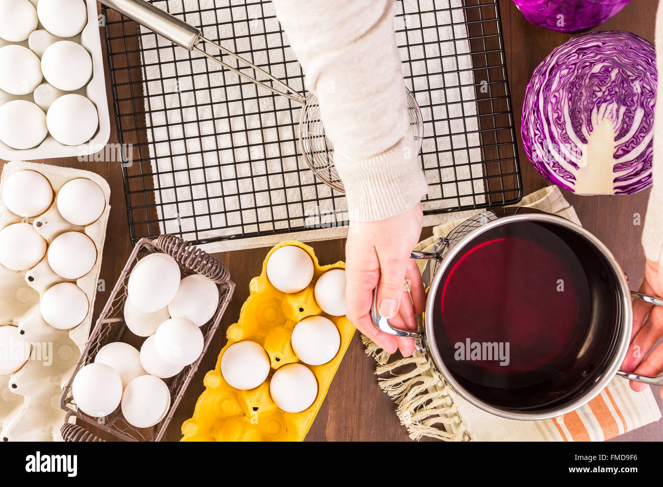 Dyeing Easter eggs with natural dye colors Stock Photo - Alamy