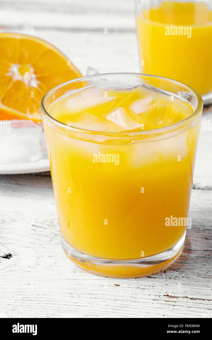 Glass cup with fresh orange juice vitamin Stock Photo - Alamy