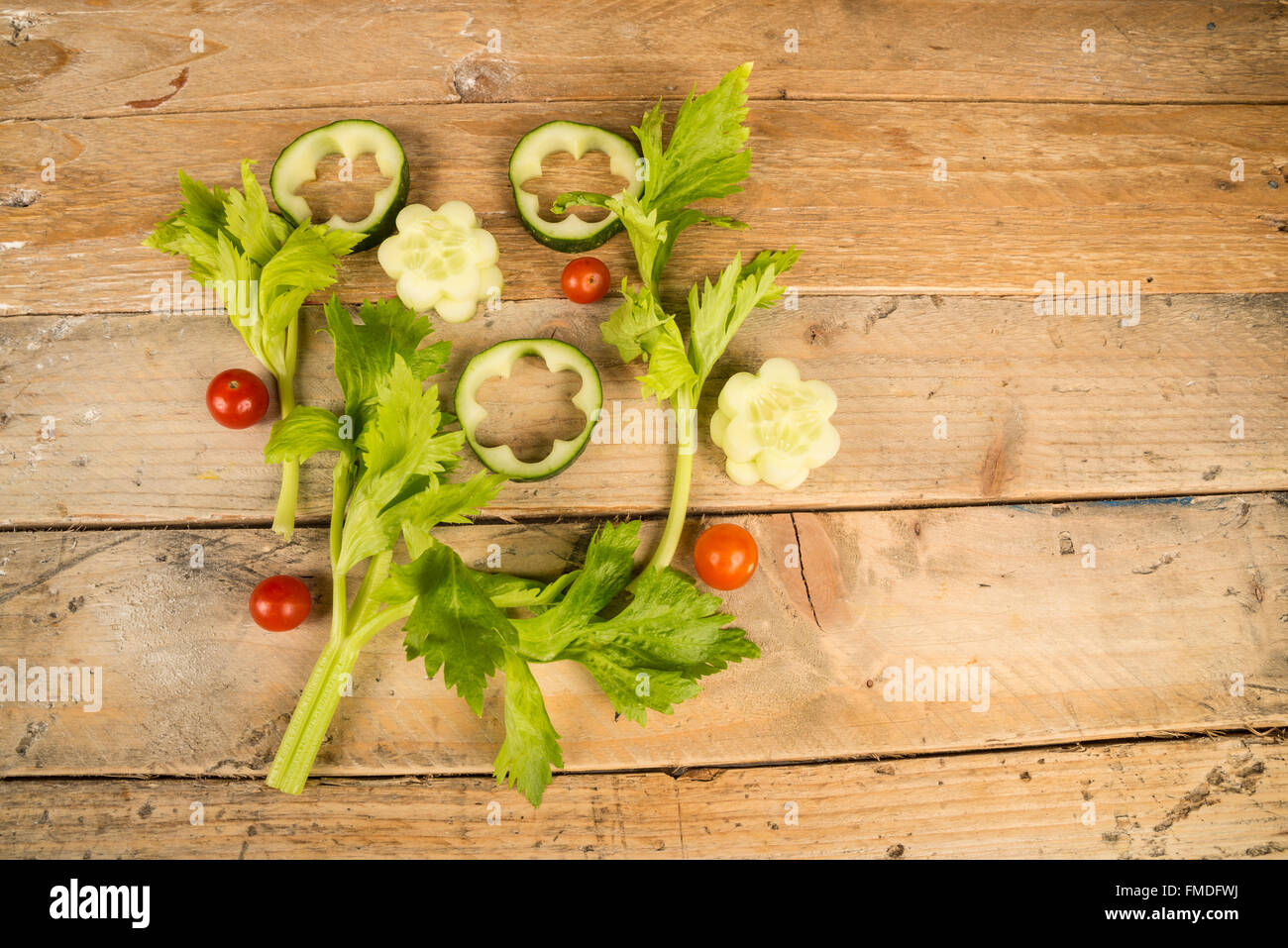 Colorful veggies cut out in fancy shapes for a kid salad Stock Photo ...