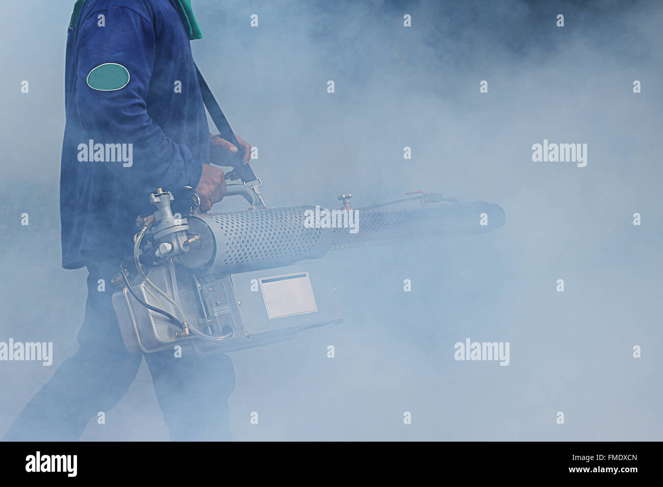 Fogging mosquito to prevent of dengue fever Stock Photo - Alamy