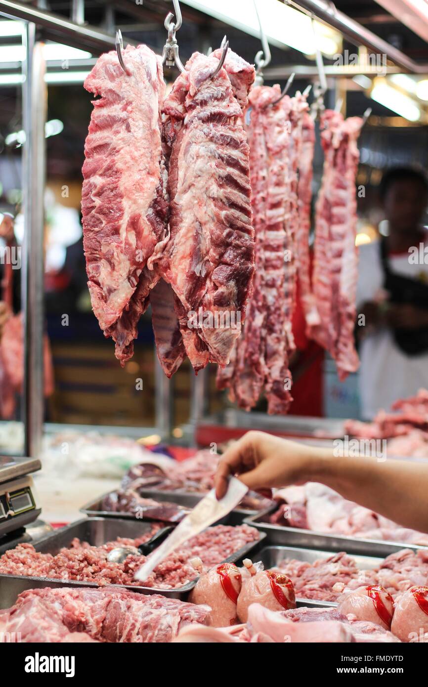 Hanging pork ribs outside at the butcher Stock Photo - Alamy