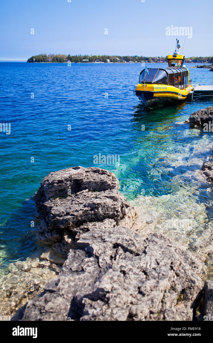 a tourism boat on the lake Stock Photo - Alamy