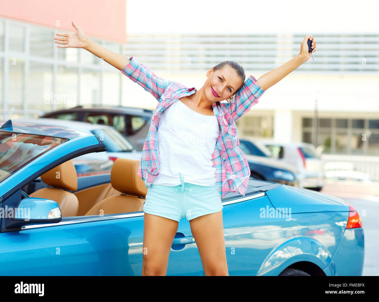 Girl standing up in convertible car hi-res stock photography and images ...