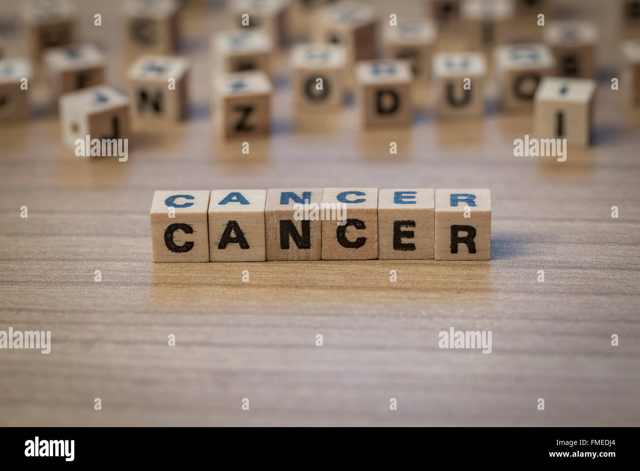 Cancer written in wooden cubes on a table Stock Photo - Alamy