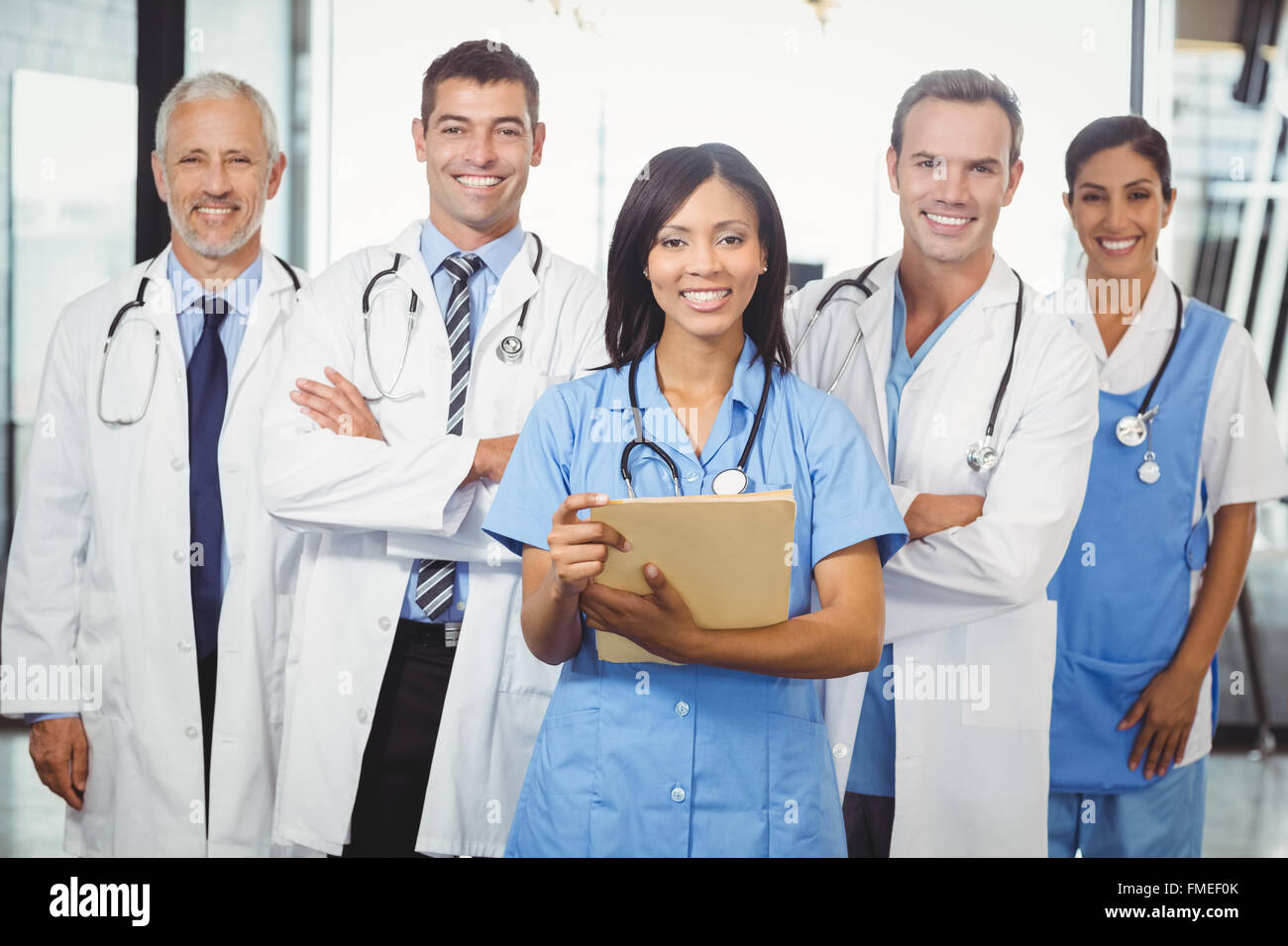 Portrait of medical team standing together Stock Photo - Alamy