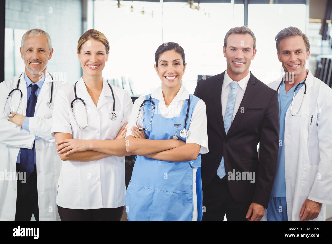 Medical team smiling in hospital Stock Photo - Alamy