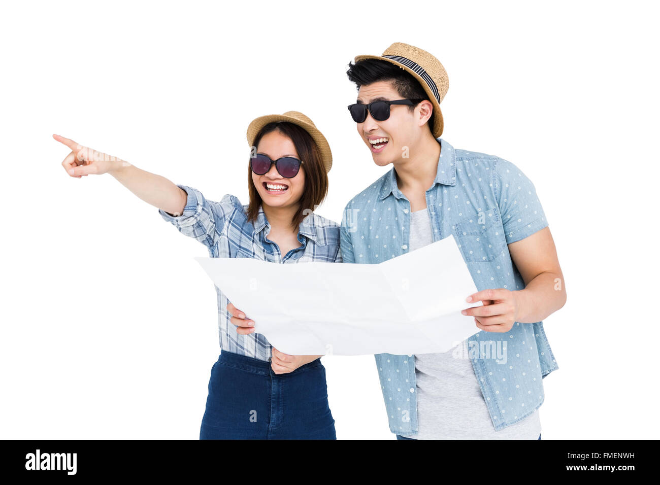 Young couple using map for direction Stock Photo - Alamy