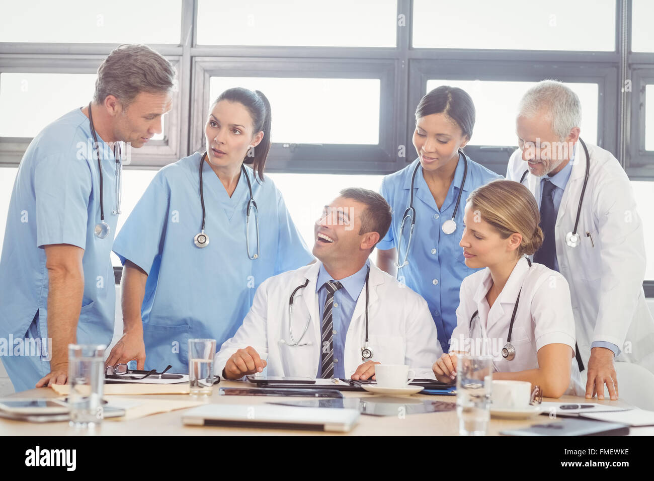 Medical team interacting in conference room Stock Photo - Alamy