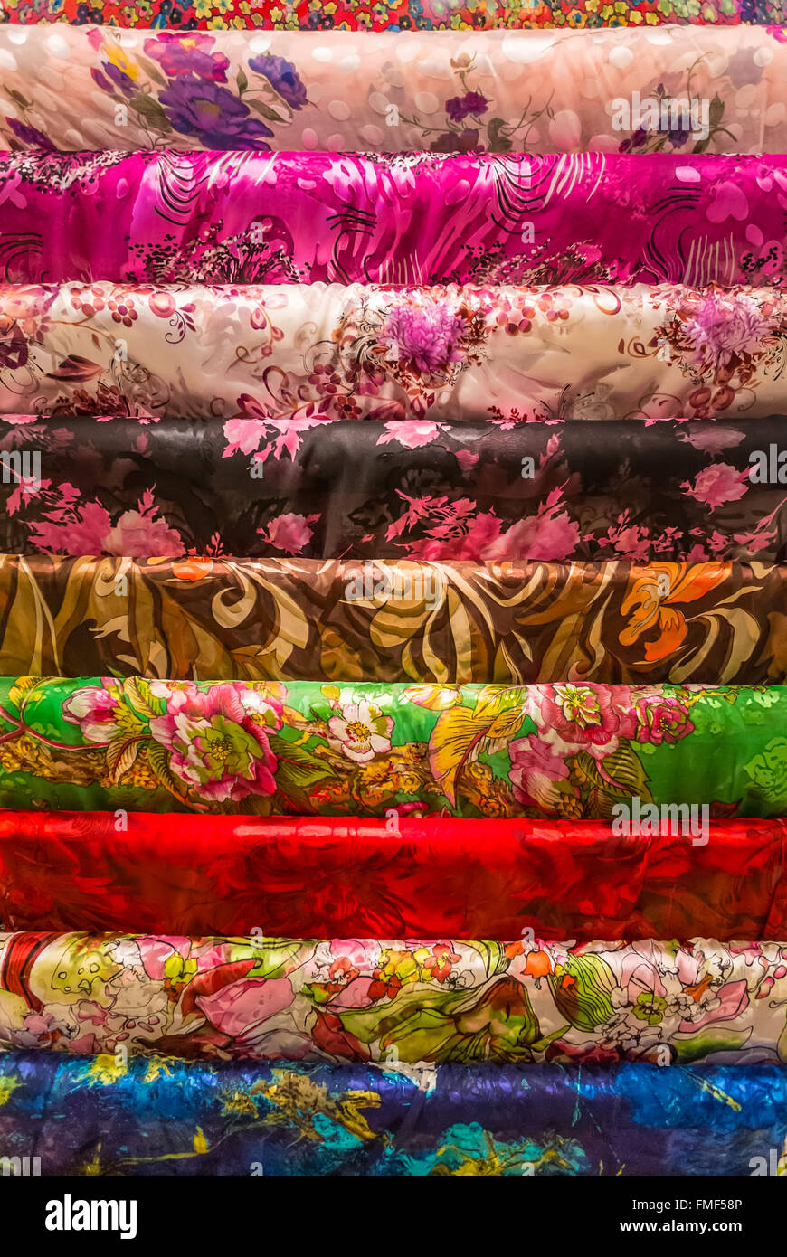 A selection of silk fabrics viewed vendor in Beijing, China Stock Photo ...
