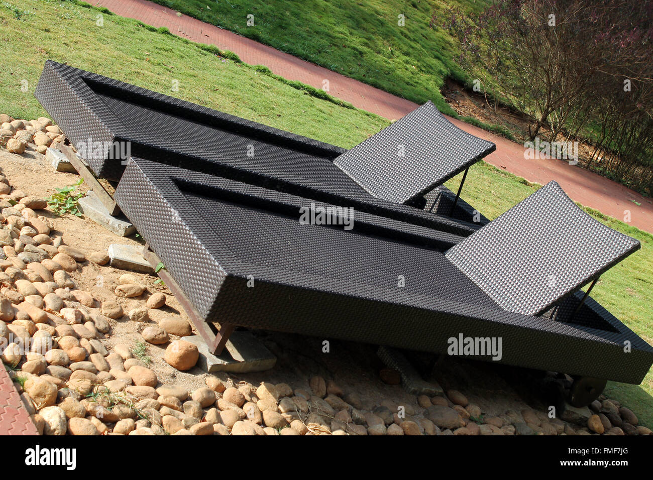 Sunbath benches for swimmers Stock Photo - Alamy