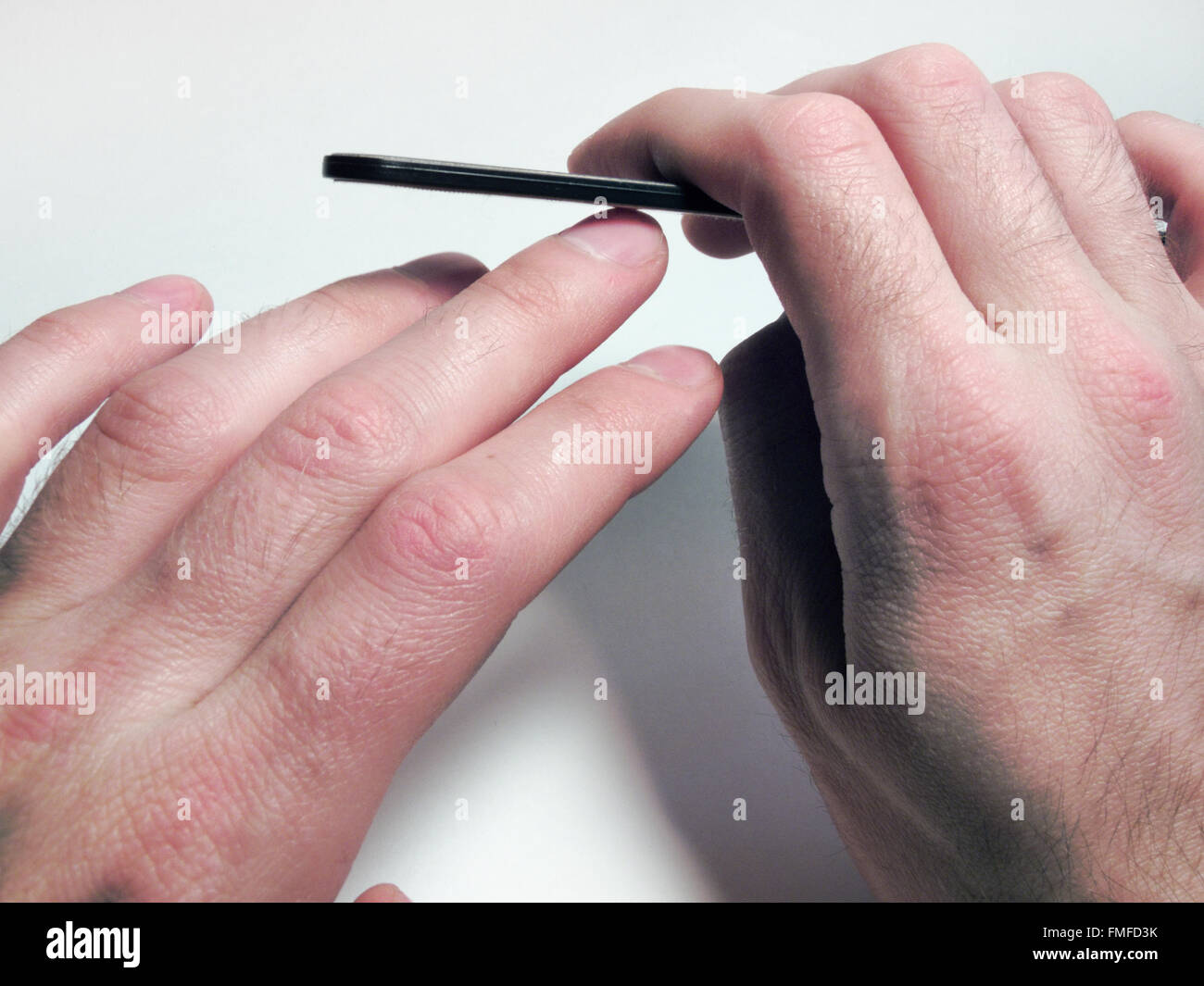 grooming. on man's hand Stock Photo - Alamy