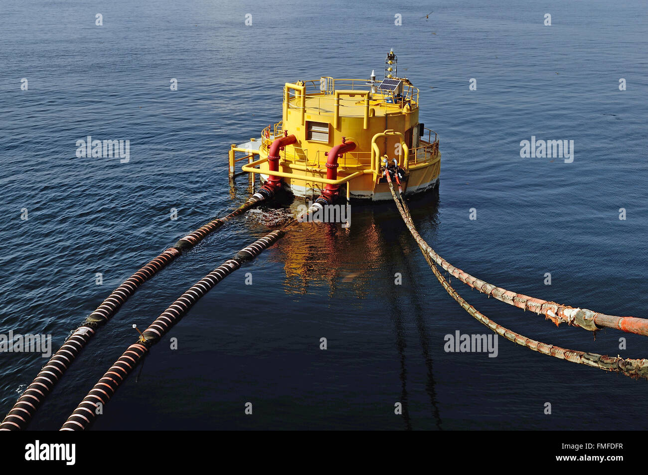 Supply vessel during operation along side with a drilling rig Stock ...