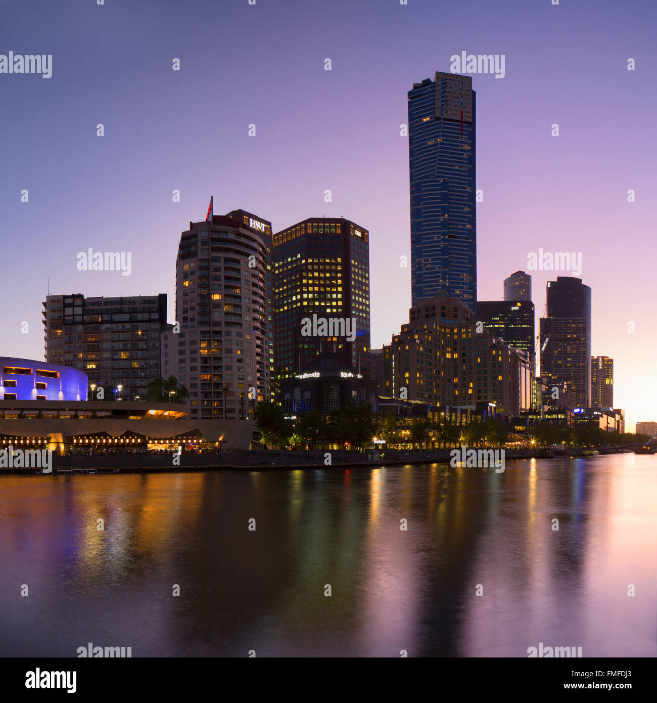 View of Eureka Tower and skyline along Yarra River at dusk, Melbourne ...