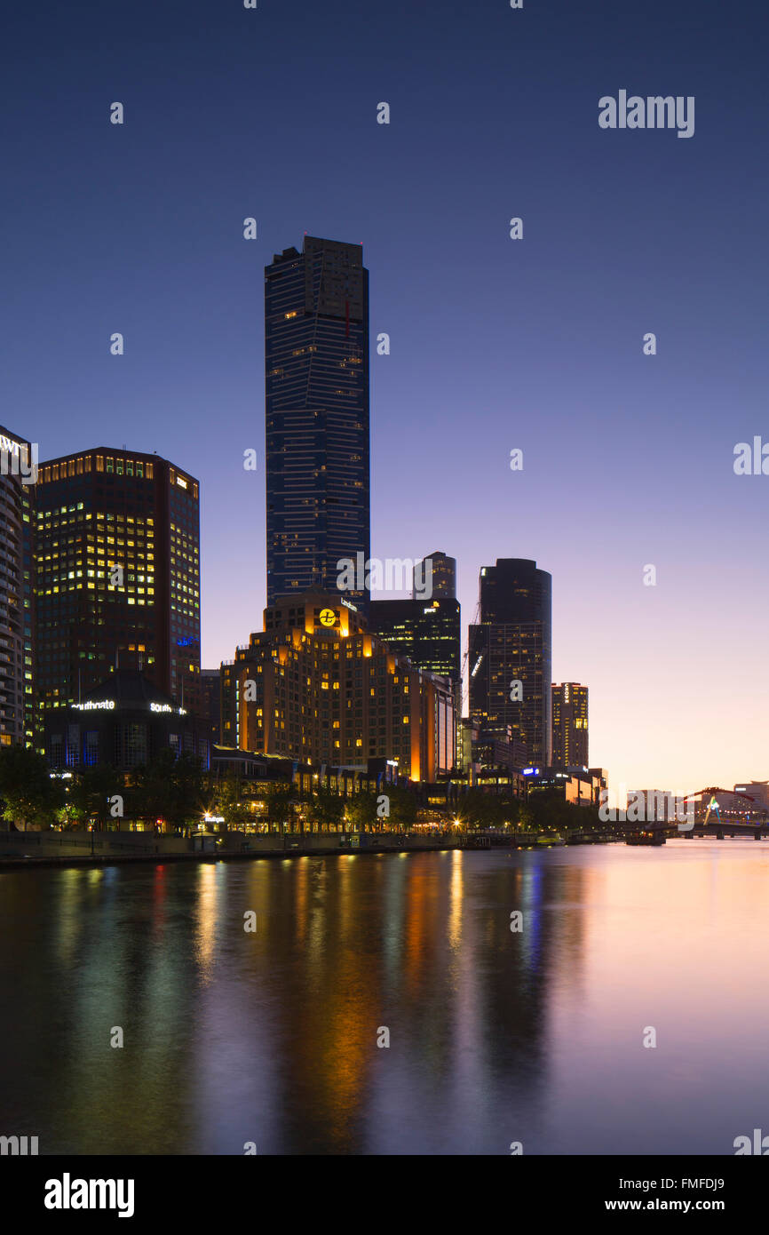 Eureka Tower and skyline along Yarra River at dusk, Melbourne, Victoria ...