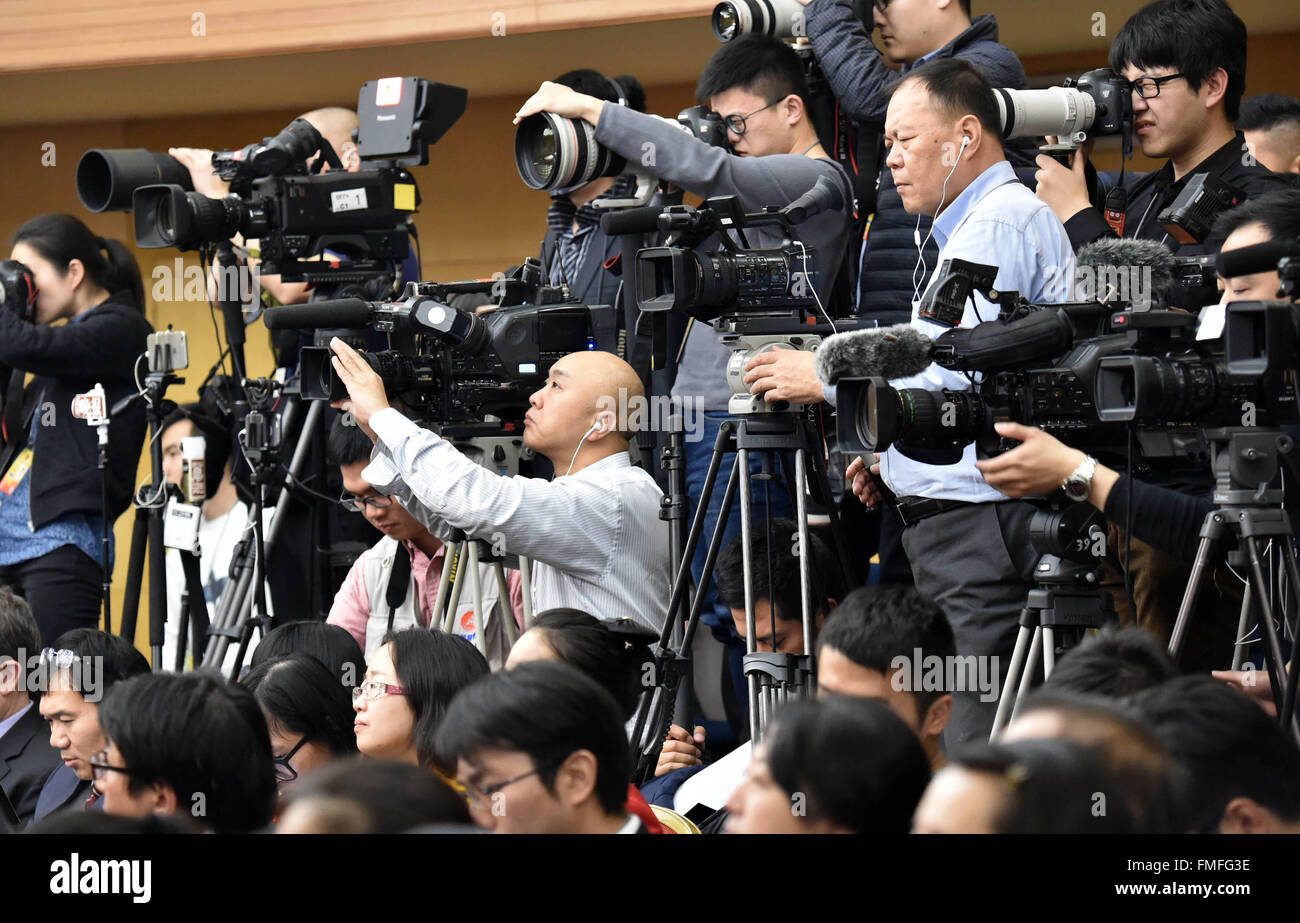 Beijing, China. 12th Mar, 2016. Cameramen work during a press ...
