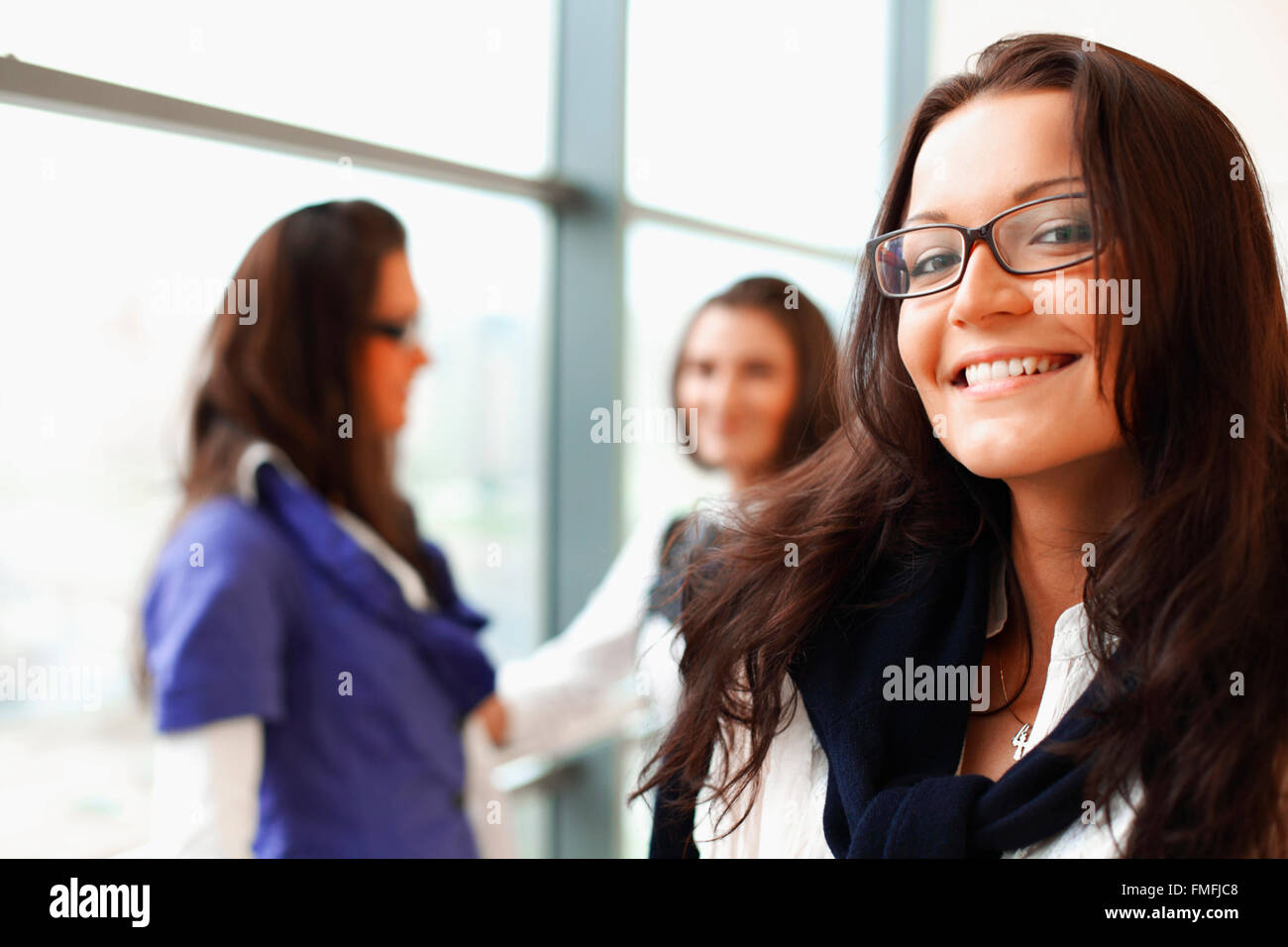 Smiley businesspeople hi-res stock photography and images - Alamy