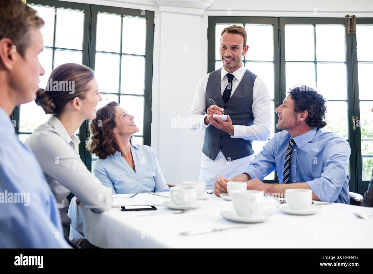 Waiter taking an order Stock Photo - Alamy Waiter taking an order Stock Photo - Alamy
