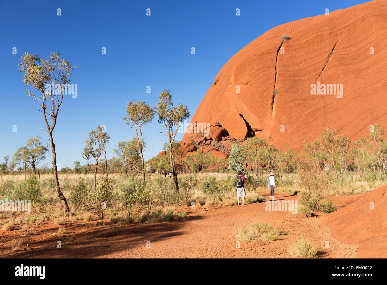 Tourists at Uluru (UNESCO World Heritage Site), Uluru-Kata Tjuta ...