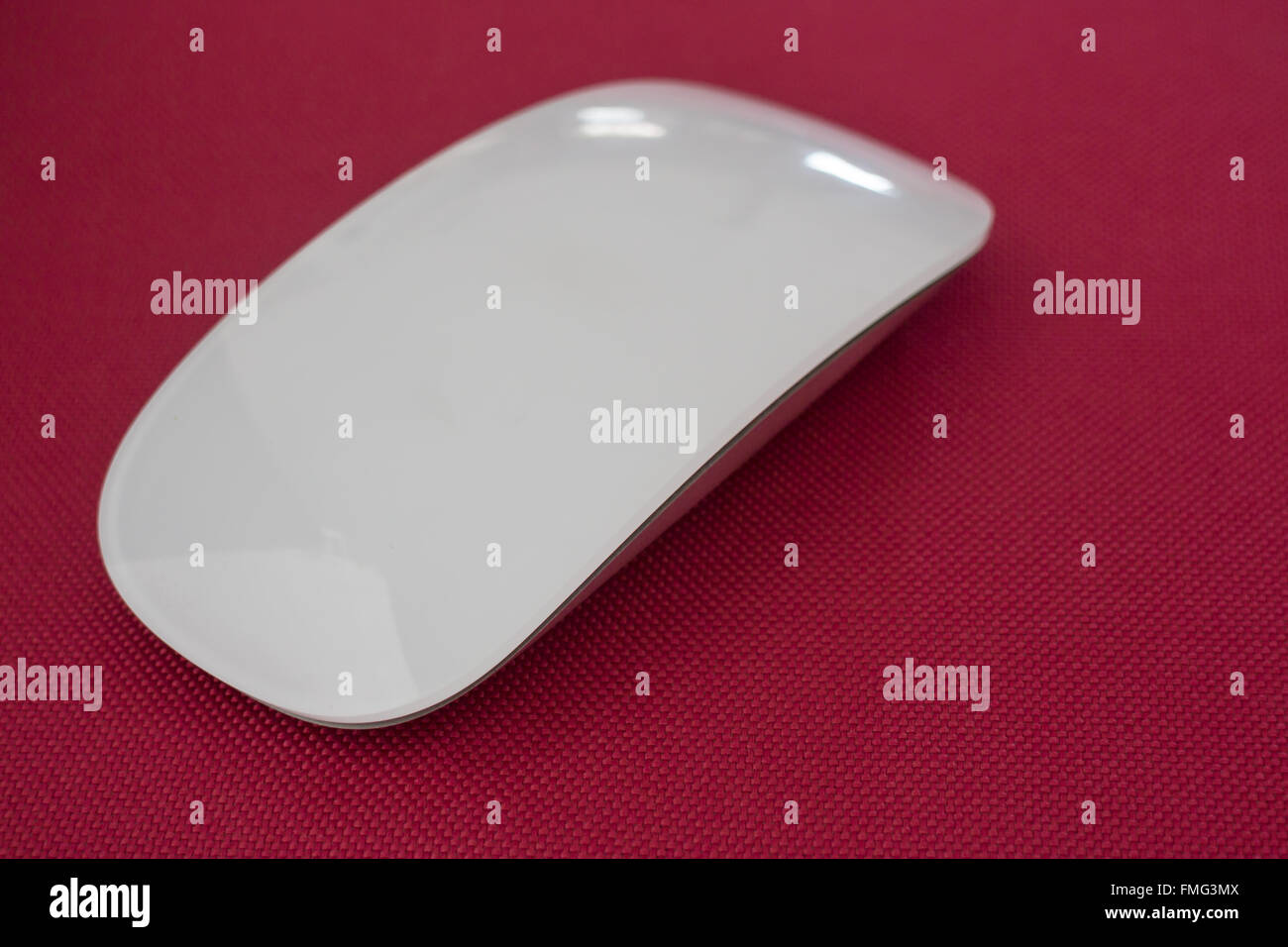 Wireless computer mouse on pink background, stock photo Stock Photo - Alamy