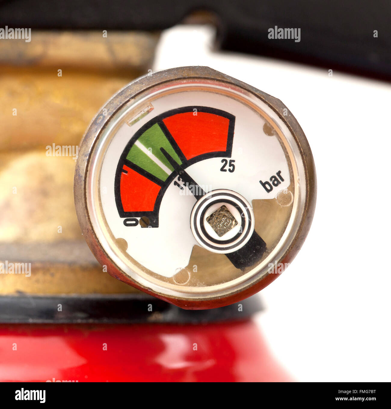 Dusty fire extinguisher fully charged, selective focus, isolated on ...