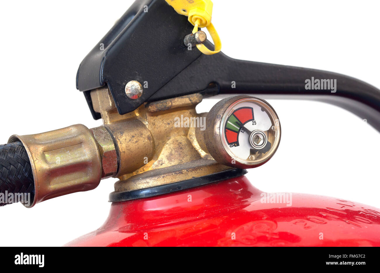 Dusty fire extinguisher fully charged, selective focus, isolated on ...