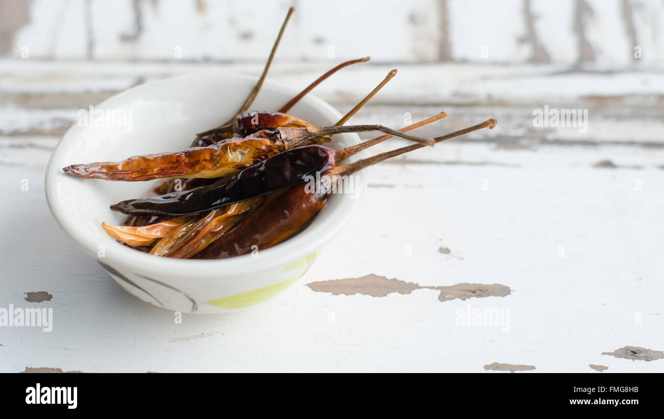 Deep fried dry chili in bowl Stock Photo - Alamy