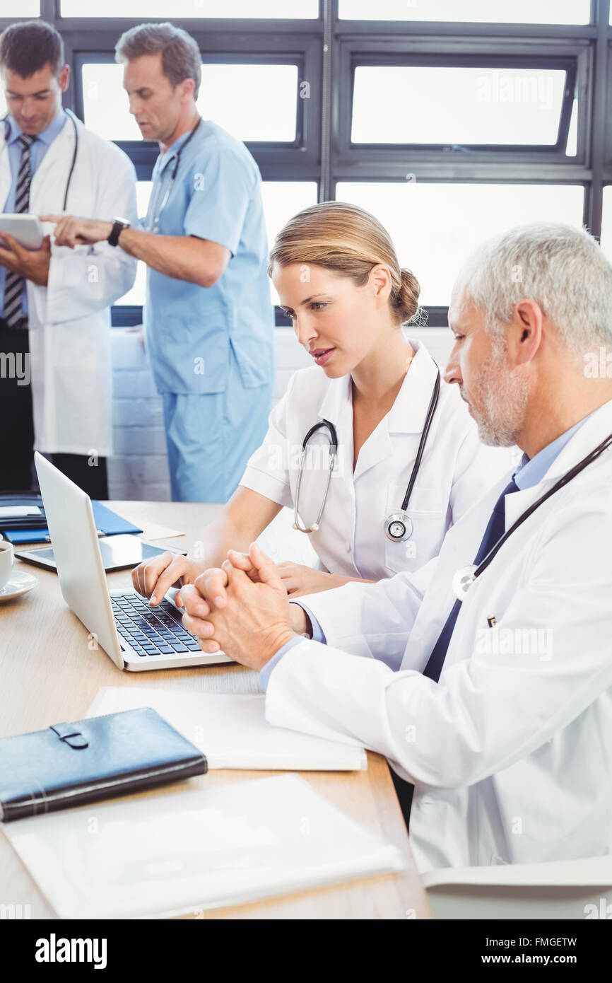Medical team interacting in conference room Stock Photo - Alamy